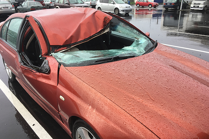 SunLive - Car crushed by toppled container - The Bay's News First